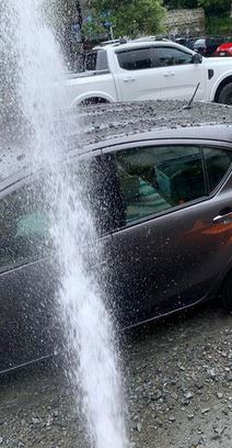 Wellington.Scoop » Geyser from broken water main damages cars in Aro Street